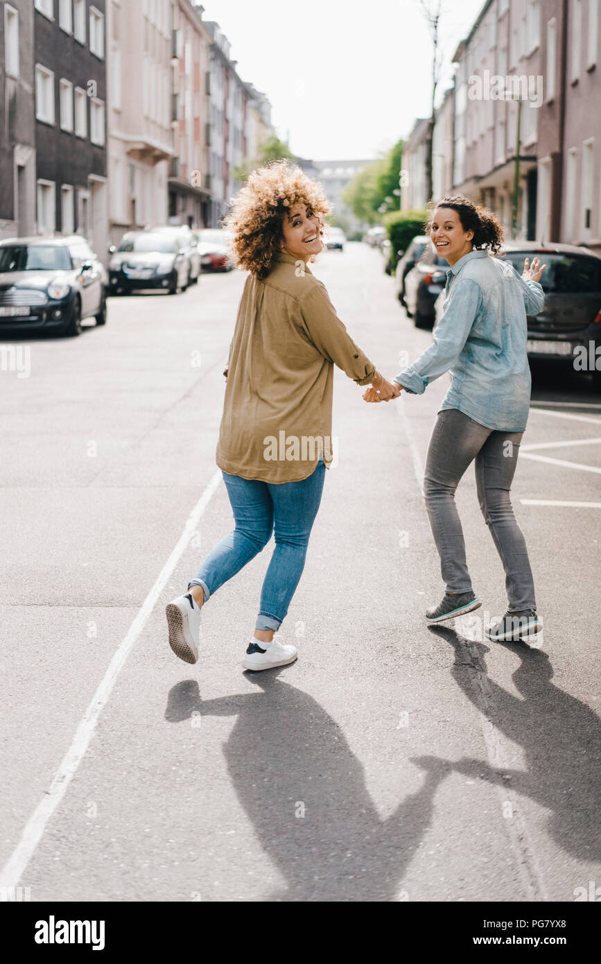 2 Best Friends Holding Hands