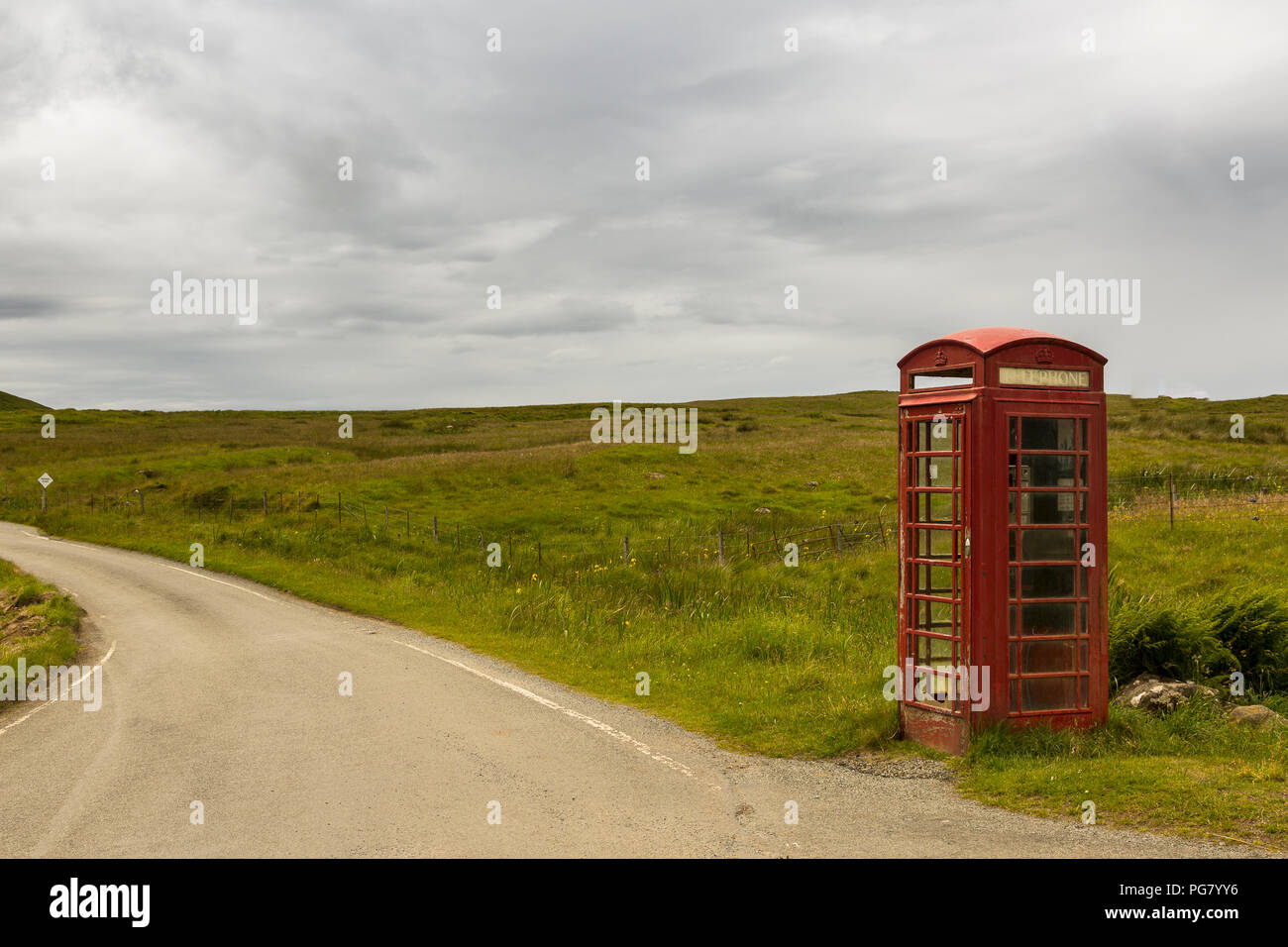 UK, Scotland, Isle of Skye, red old telephone booth at roadside Stock ...