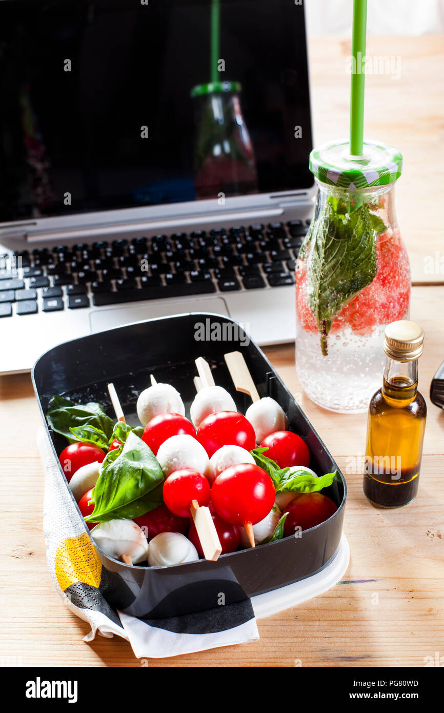 Bottle infused water laptop desk hi-res stock photography and images ...