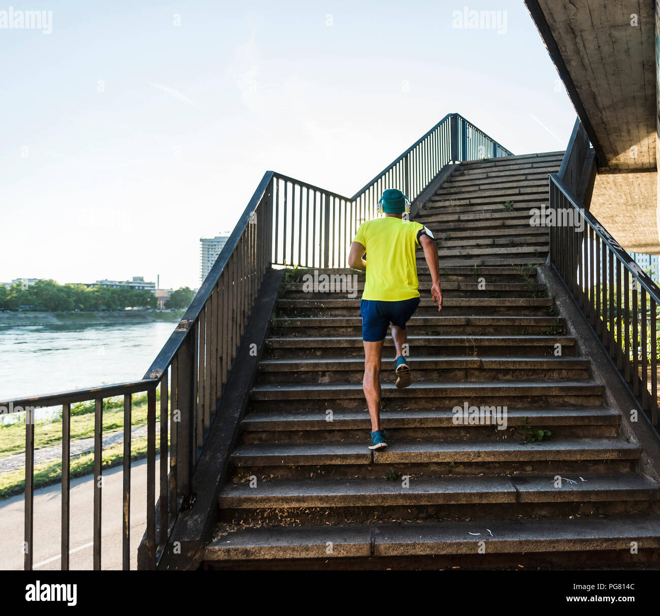 Man running up bridge stairs hi-res stock photography and images - Alamy