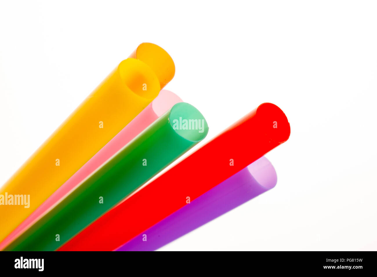 different color of straw on a white background Stock Photo - Alamy