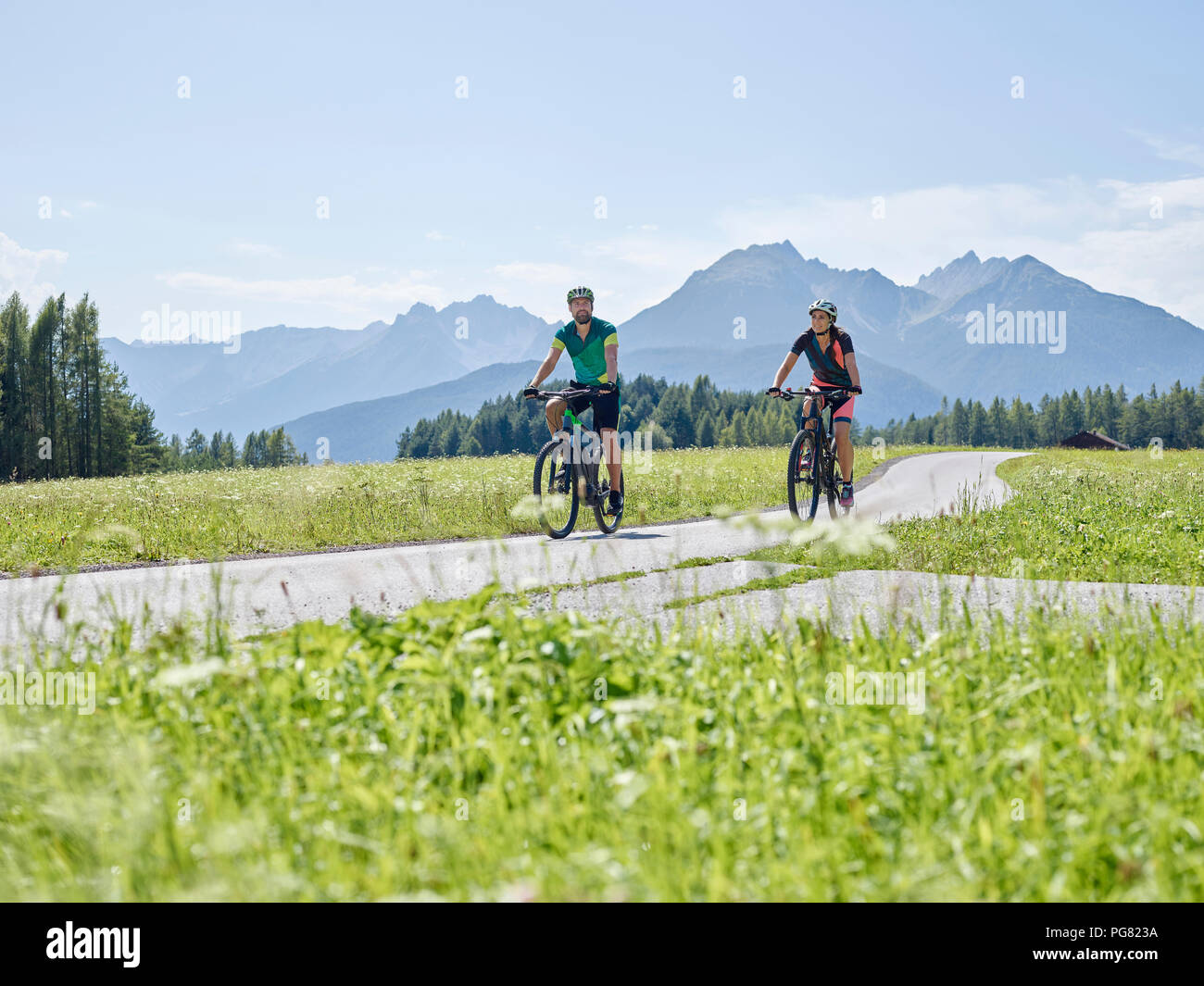Bike riding with helmets in austria hi-res stock photography and images ...