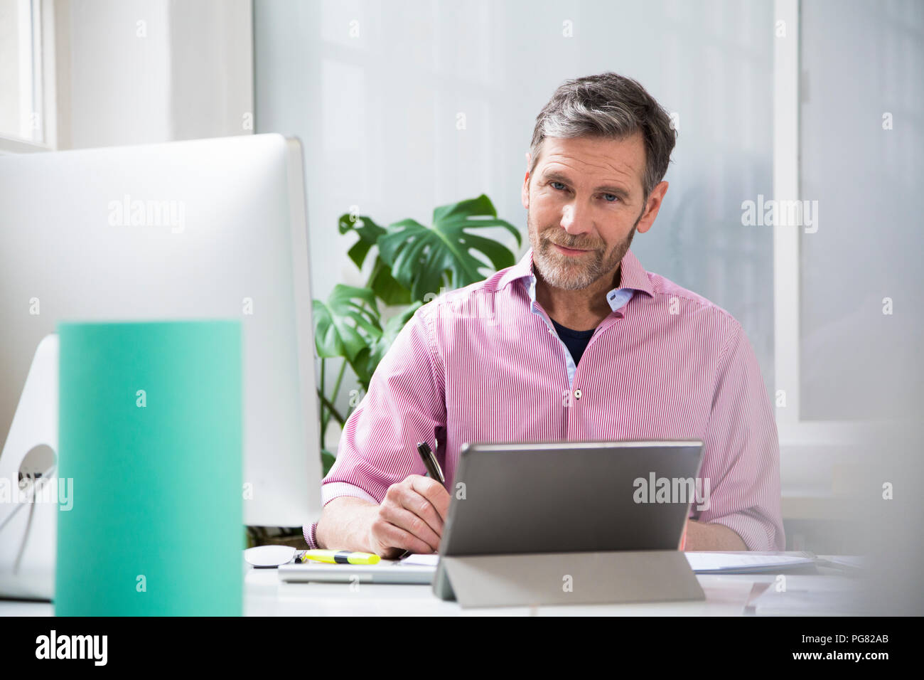 Communication office employees man hi-res stock photography and images ...