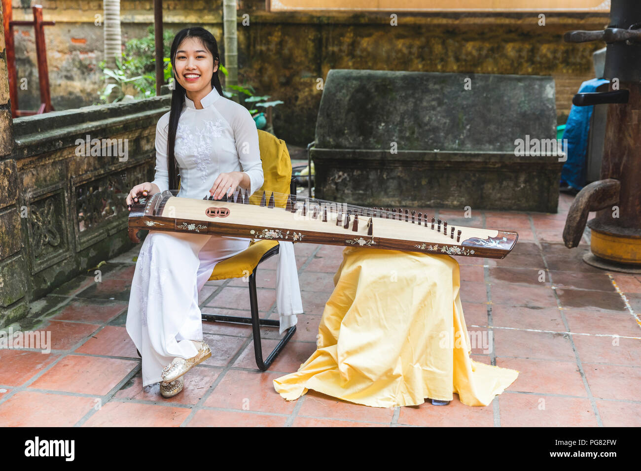 Vietnam, Hanoi, young woman with Dan tranh Stock Photo - Alamy
