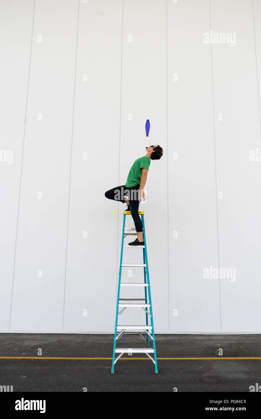 Balancing free standing ladder hi-res stock photography and images - Alamy