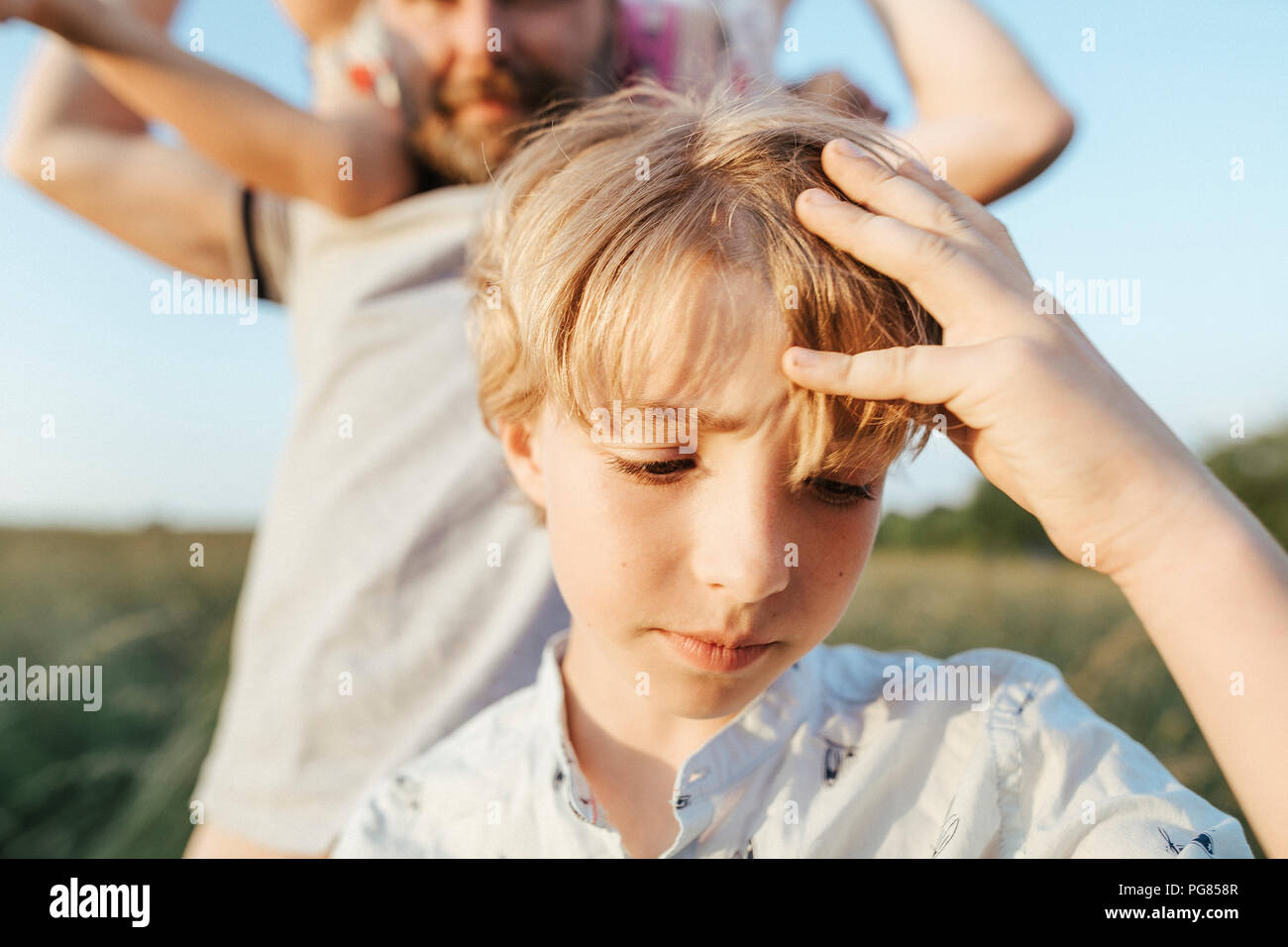 Hand and head hi-res stock photography and images - Alamy
