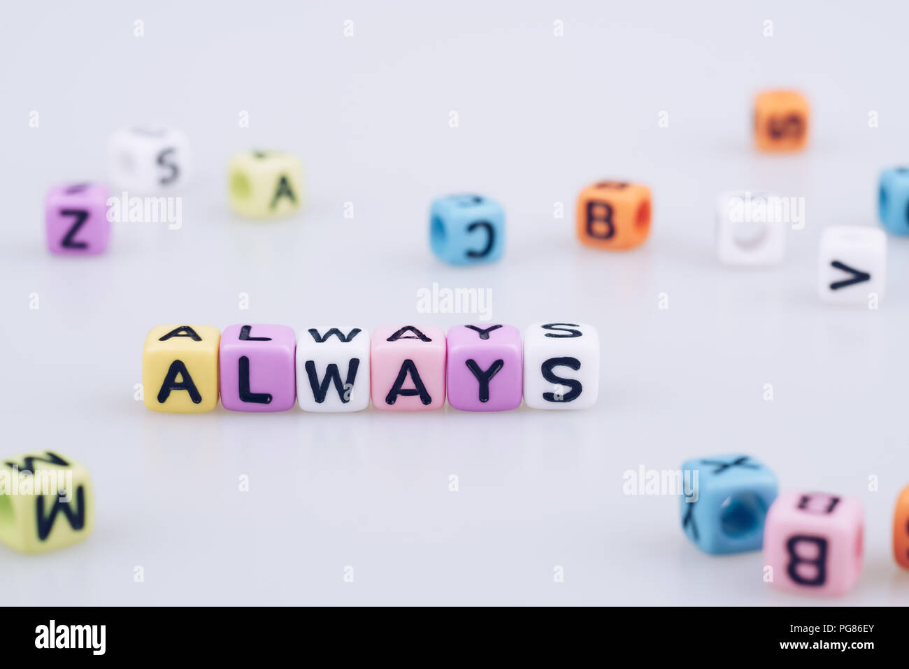 ALWAYS word text written on colorful cube with bokeh cube word block ...