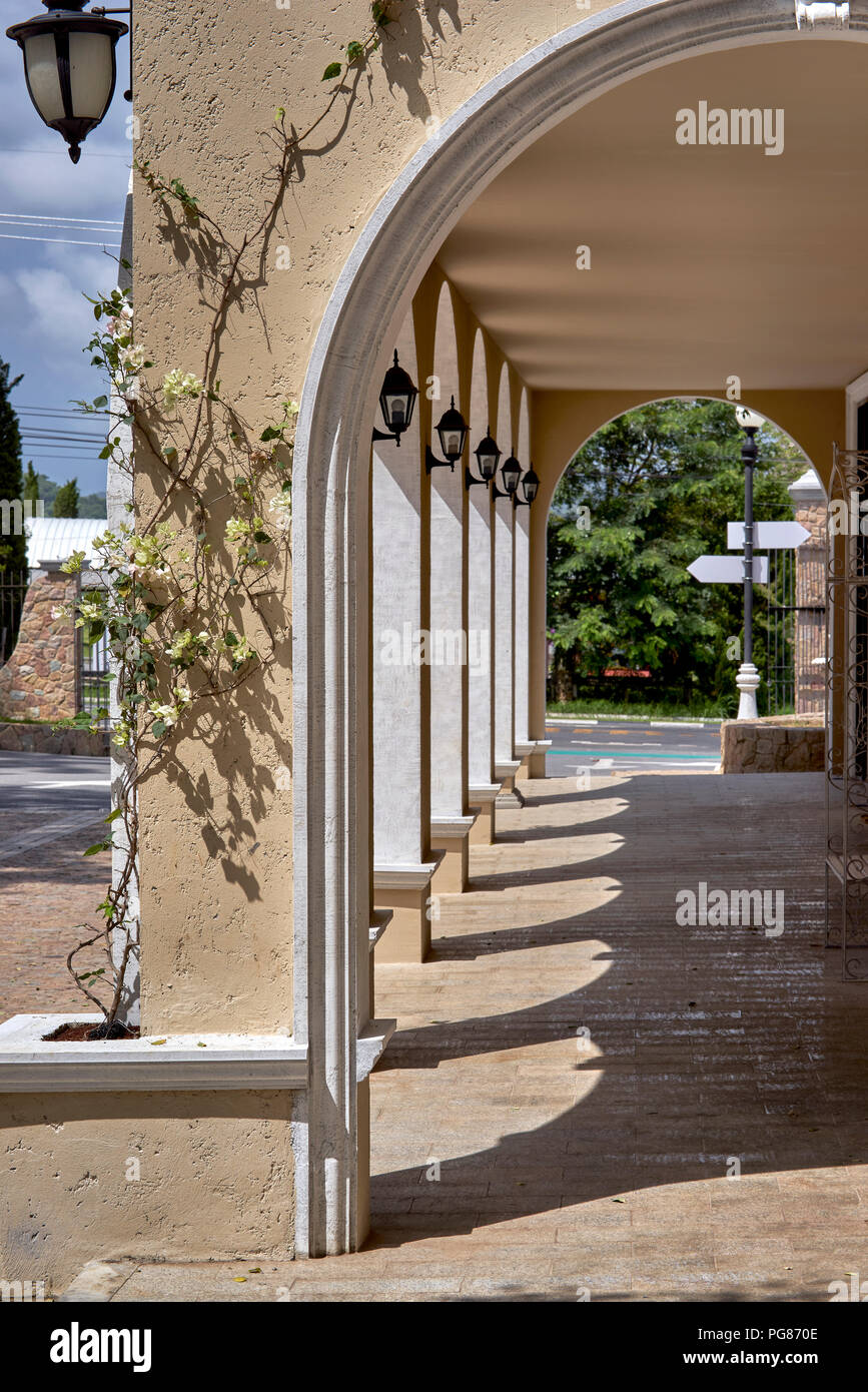 Arched walkway with column support Stock Photo - Alamy