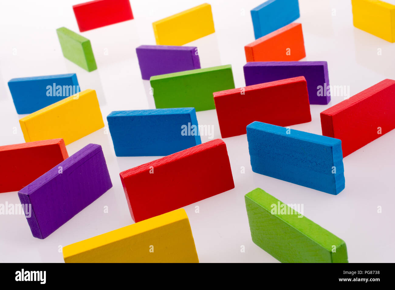 Color dominoes on a white background Stock Photo - Alamy