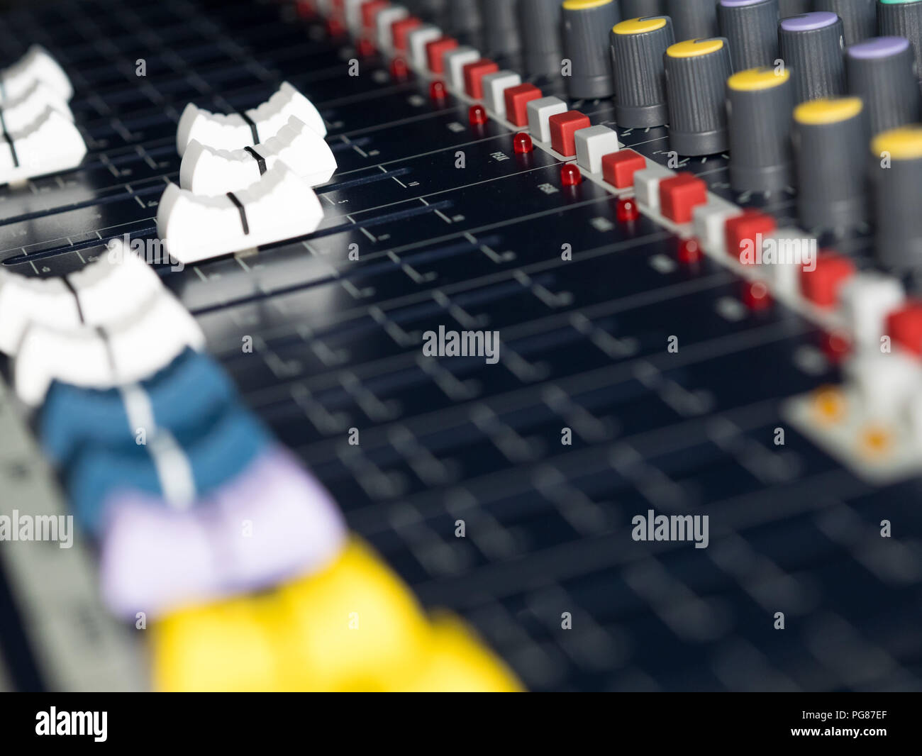 Controls and buttons on audio mixer close up Stock Photo - Alamy