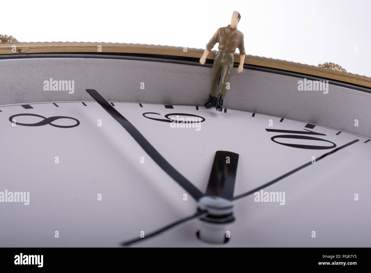 model man in a clock on a white background Stock Photo - Alamy