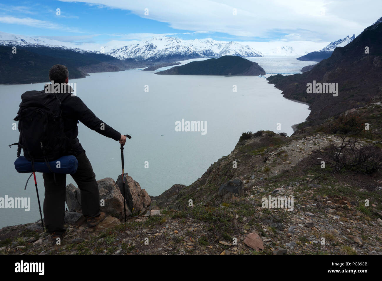 Trekker contemplating Grey glacier.Grey Lake.Torres del Paine National ...