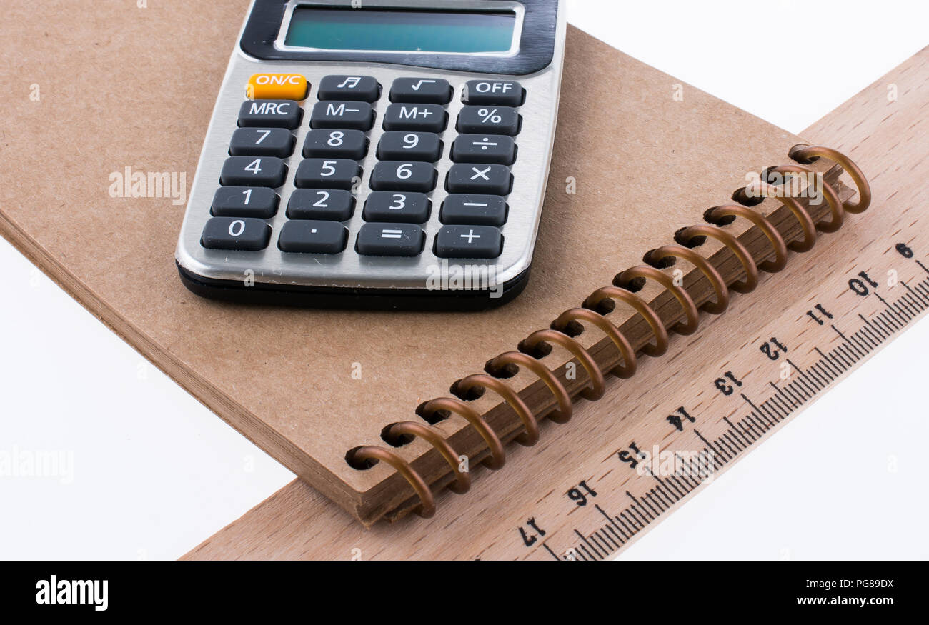 Calculator, ruler, notebook on white background Stock Photo - Alamy