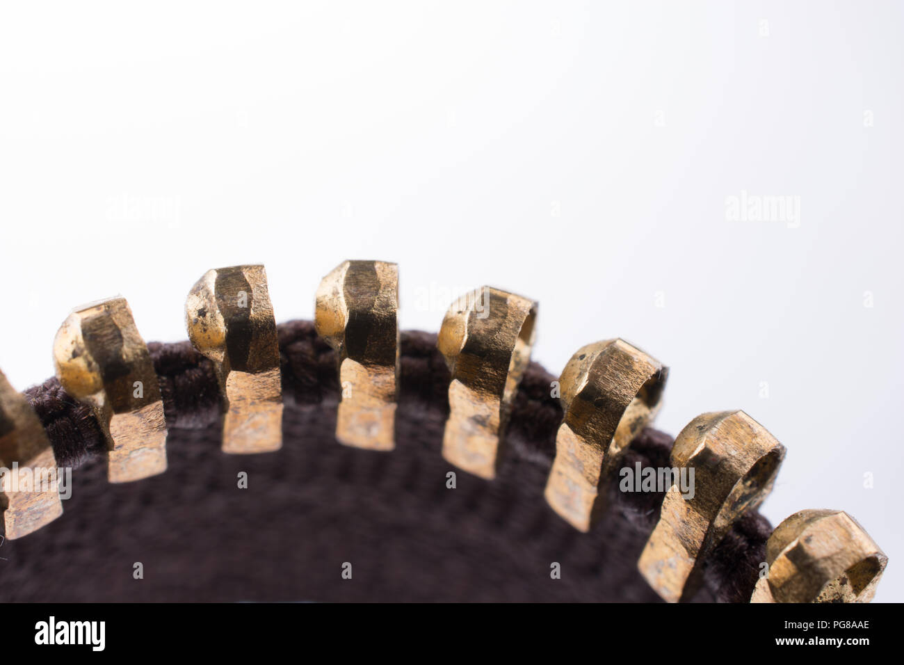 Close up or macro of a brown zipper on white background Stock Photo - Alamy