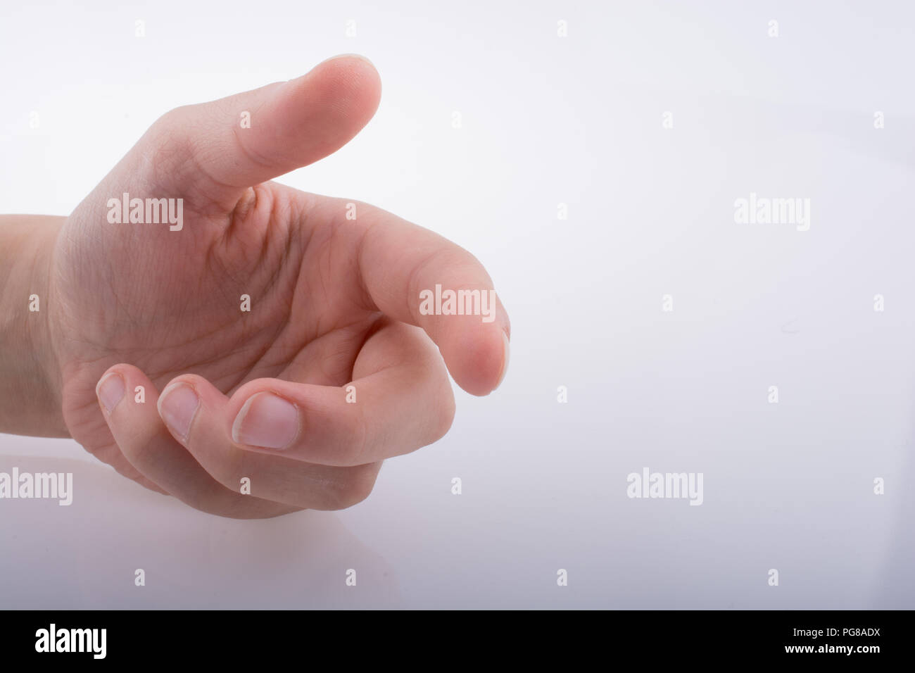 Hand pointing on a white background Stock Photo - Alamy