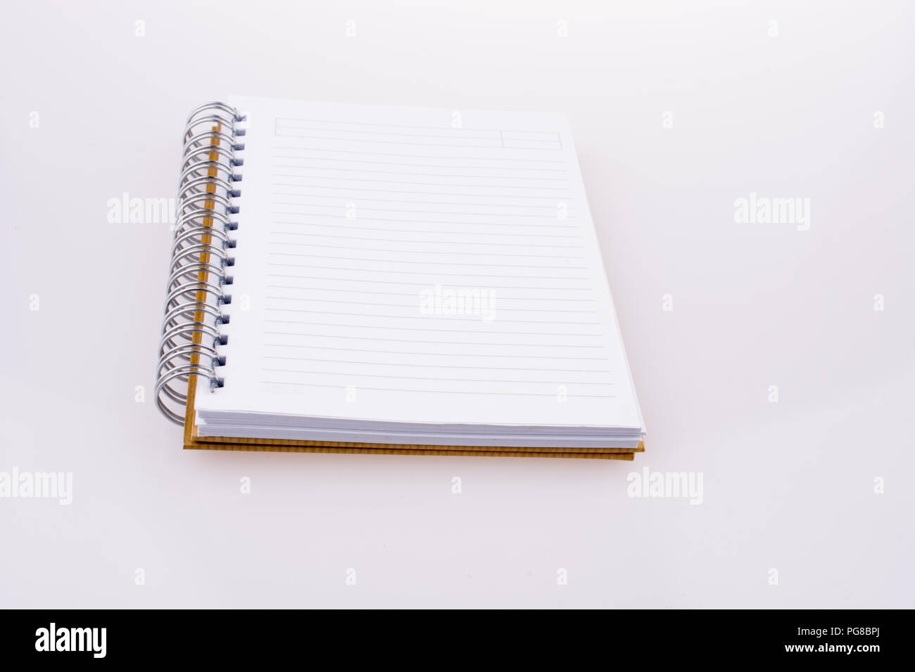 Spiral notebook on a white background Stock Photo - Alamy