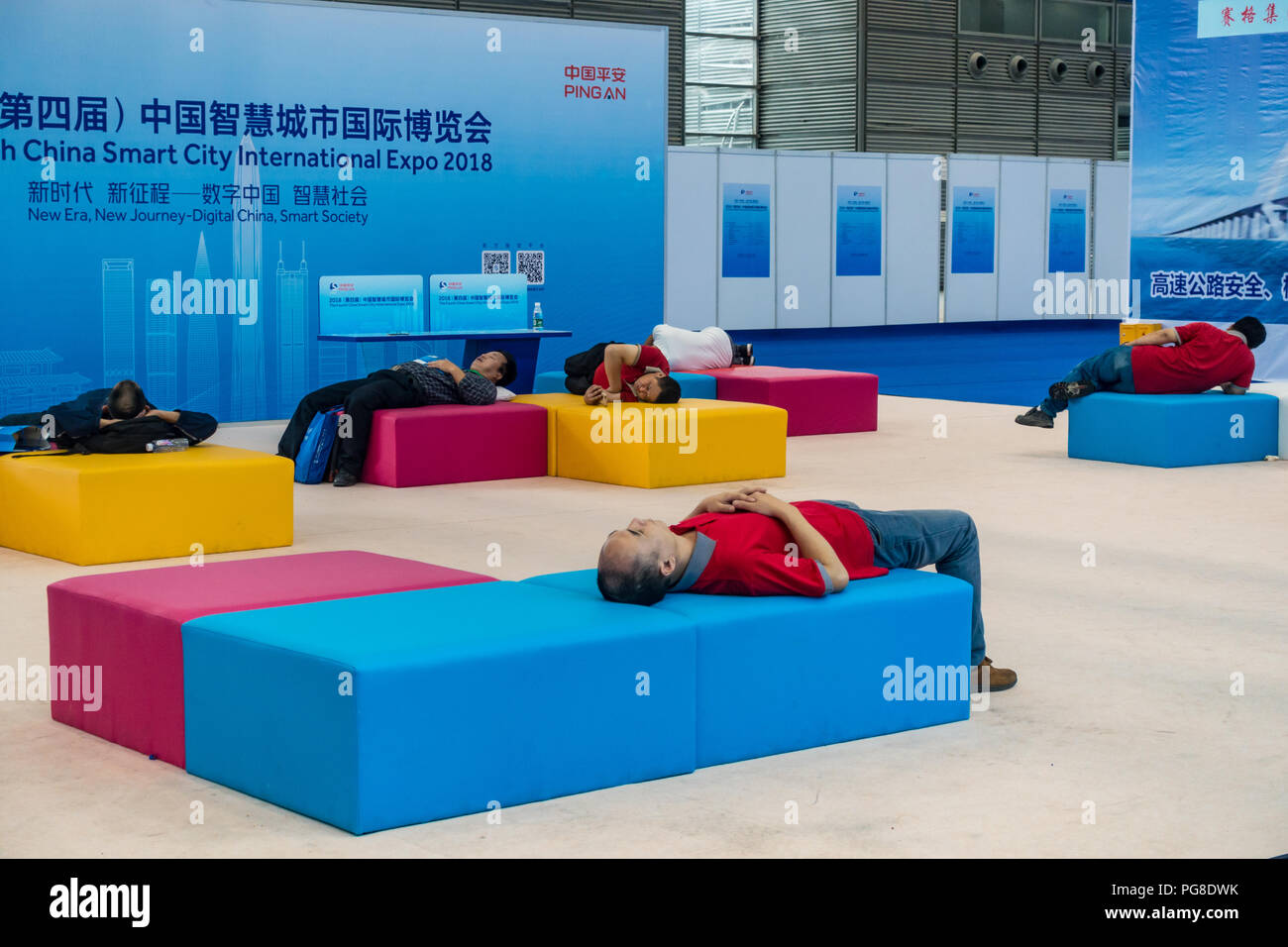 Nap at work in China Stock Photo - Alamy