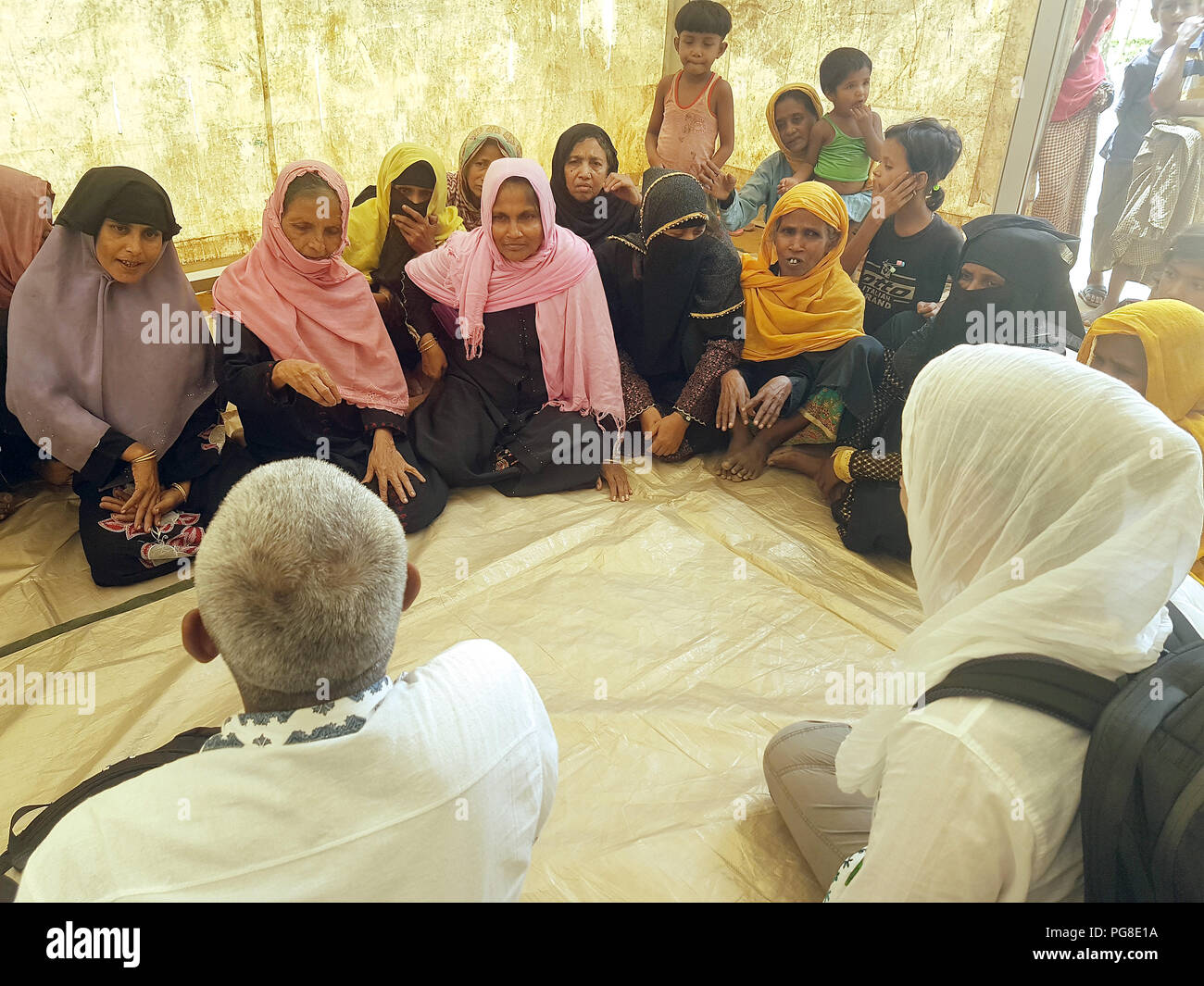 13 August 2018, Bangladesh, Cox's Bazar: Employees of Welthungerhilfe ...