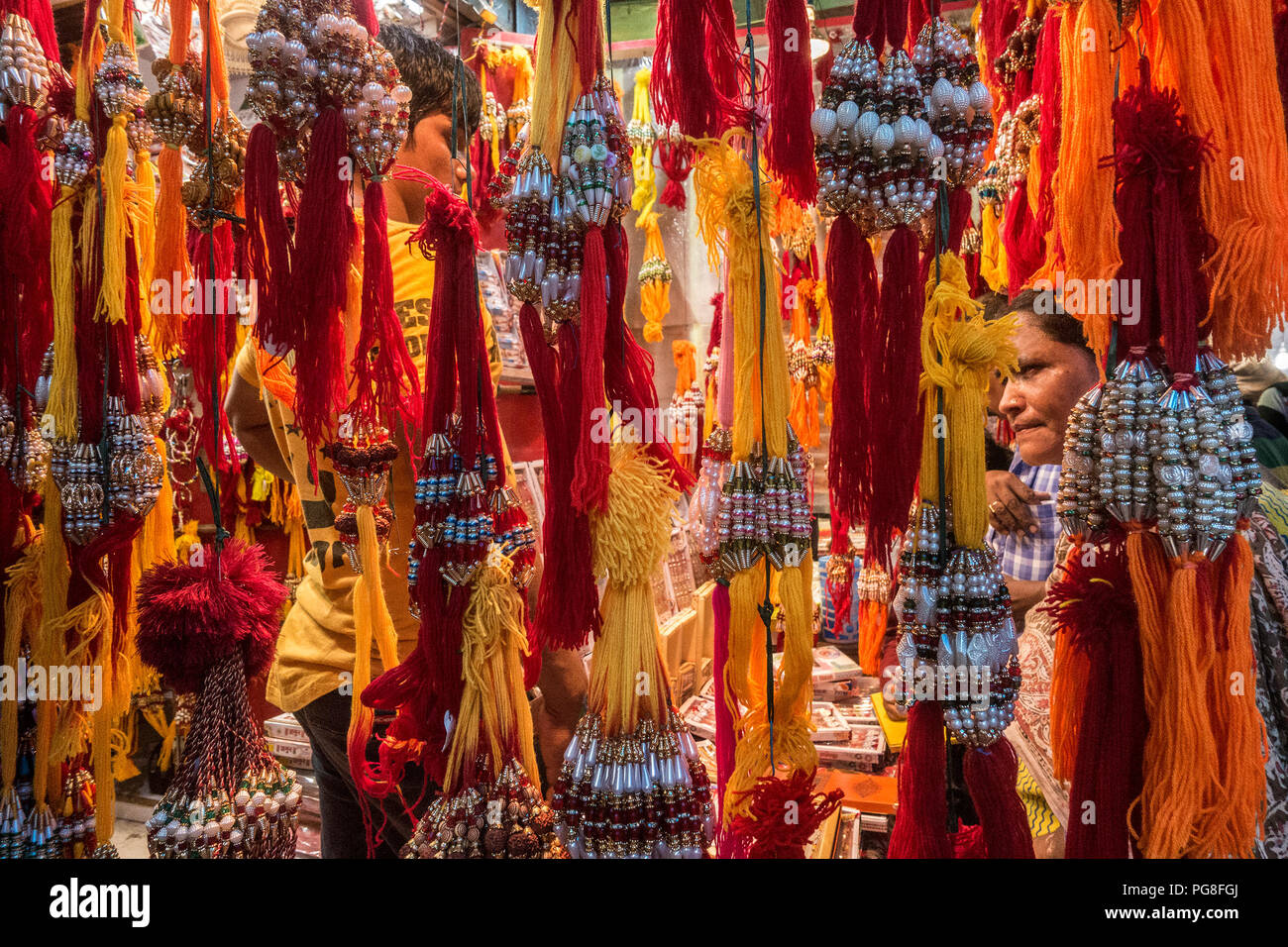 Tying threads hi-res stock photography and images - Alamy