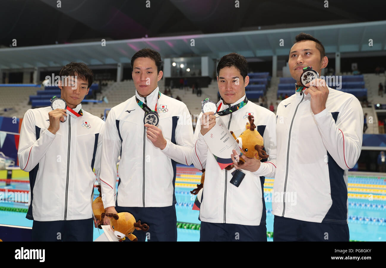 Jakarta, Indonesia. 24th Aug, 2018. Athletes of Japan pose for pictures ...