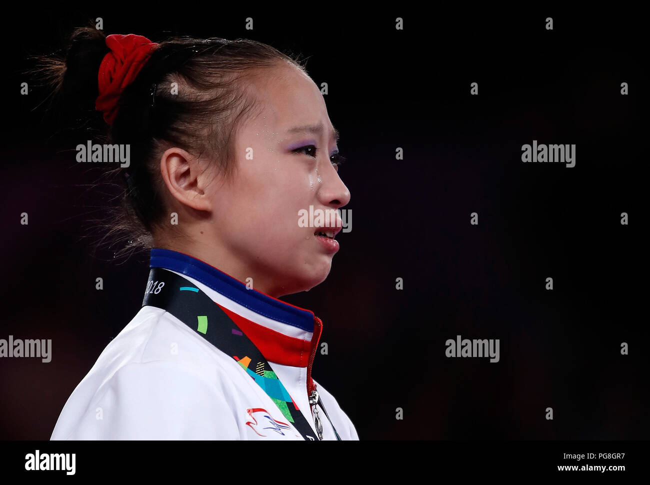 Jakarta. 24th Aug, 2018. Kim Su Jung of the DPRK weeps during the ...
