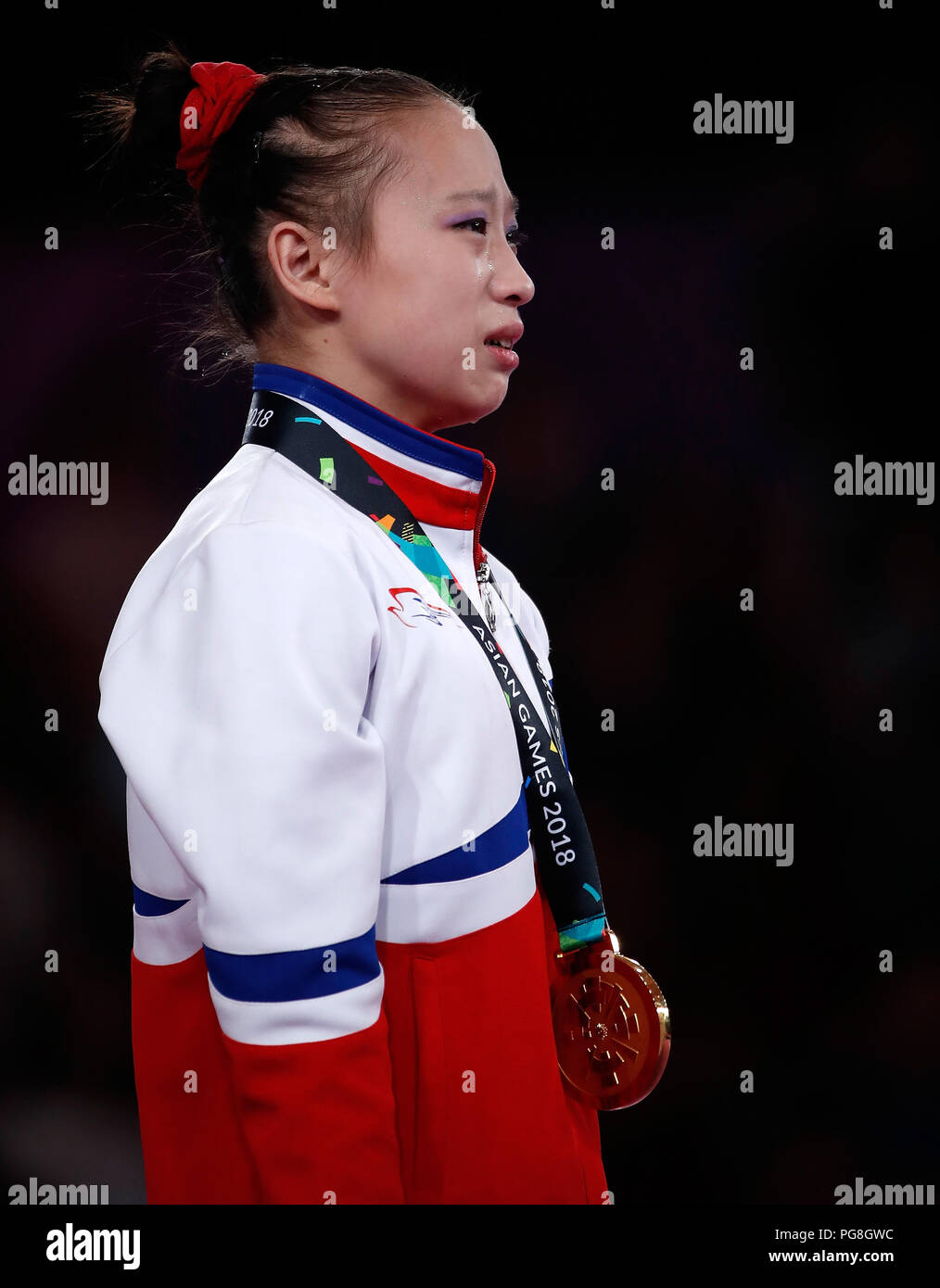 Jakarta. 24th Aug, 2018. Kim Su Jung of the DPRK weeps during the ...