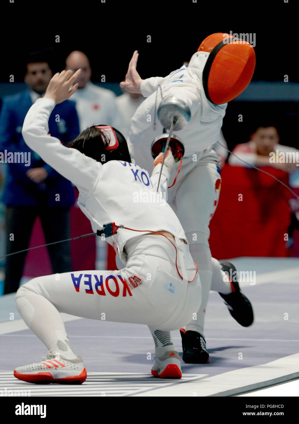 Jakarta, Indonesia. 24th Aug, 2018. Zhu Mingye (R) of China competes ...