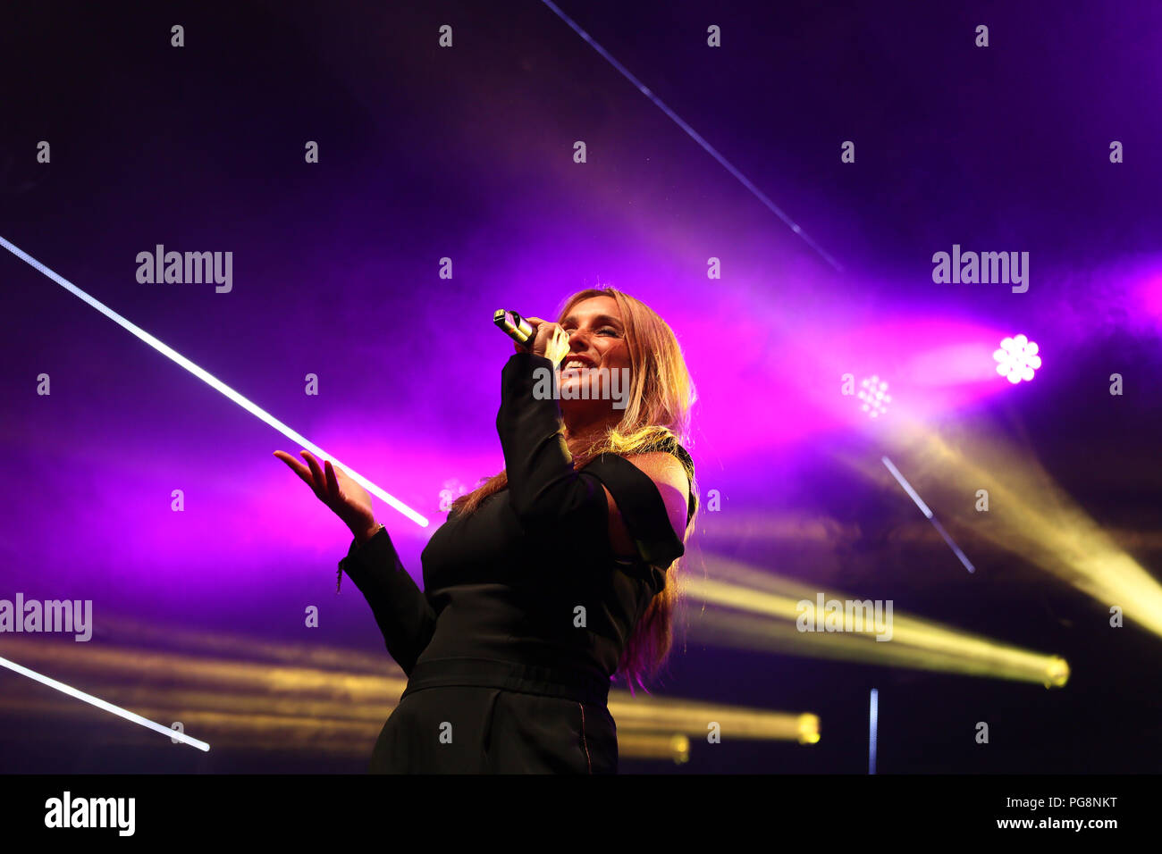 Manchester, UK. 24th Aug 2018. Singer Louise performs on the main stage ...
