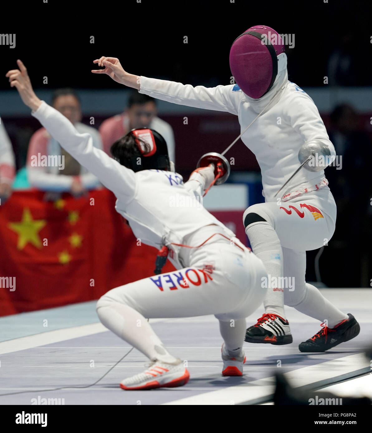 Jakarta, Indonesia. 24th Aug, 2018. Sun Yiwen (R) of China competes ...