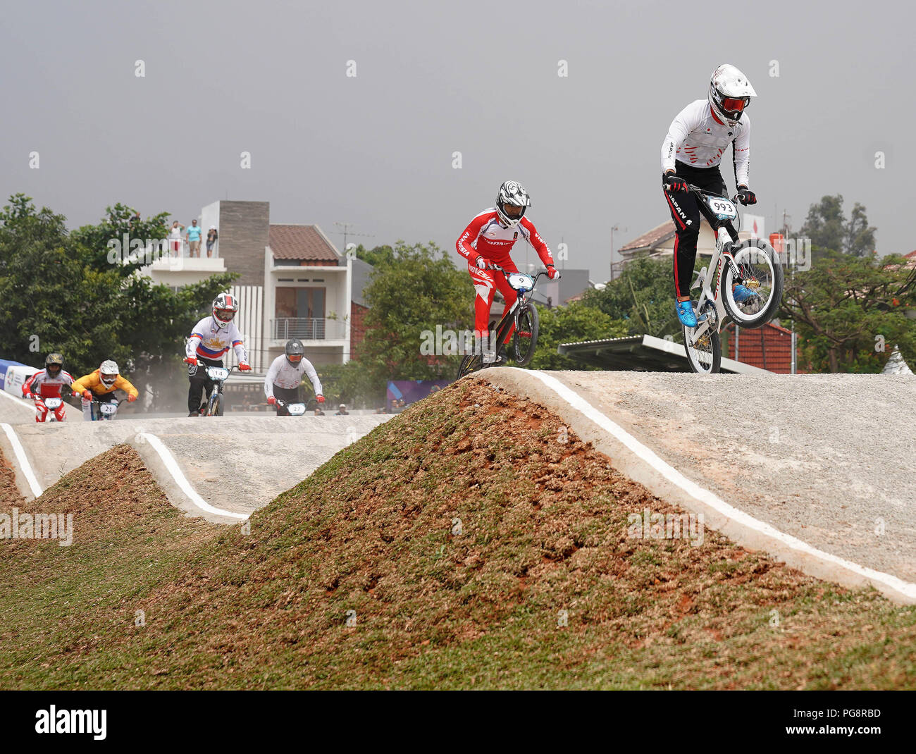 Jakarta, Indonesia. 25th Aug, 2018. Nagasako Yoshitaku (1st R) of Japan ...