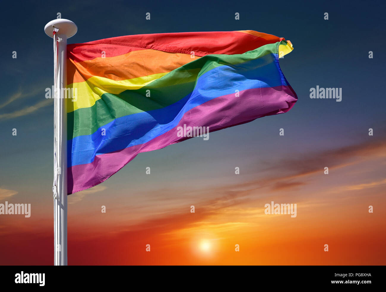 Rainbow flag being waved hi-res stock photography and images - Alamy