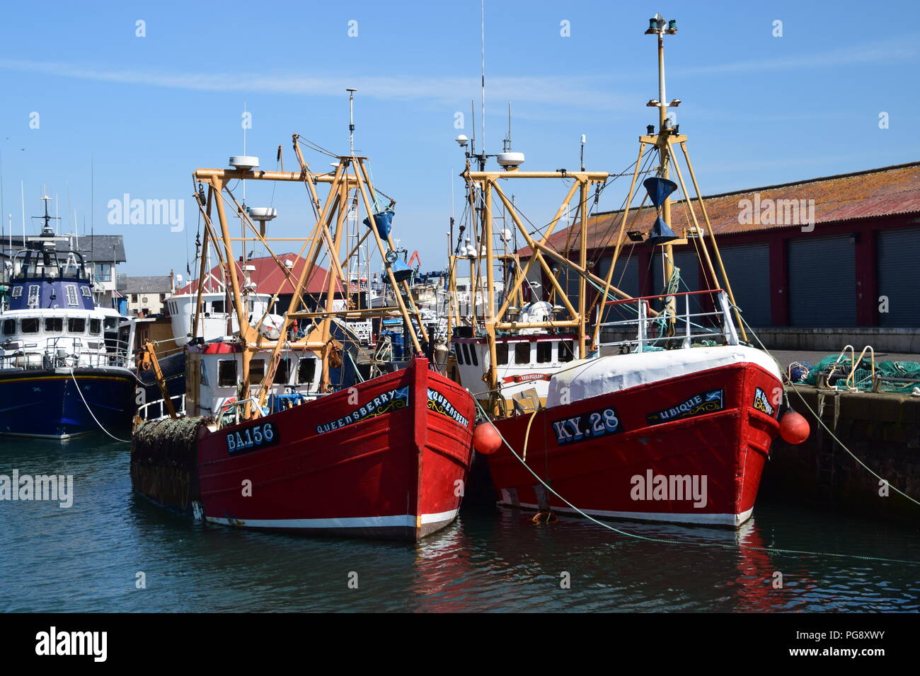 Red trawlers fishing boats in Arbroath harbour Scotland Stock Photo - Alamy Red trawlers fishing boats in Arbroath harbour Scotland Stock Photo - Alamy