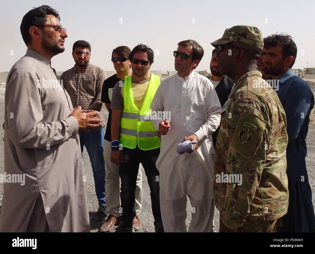 Afghan Technical Support Team member briefs Col. Jason Kelly ...
