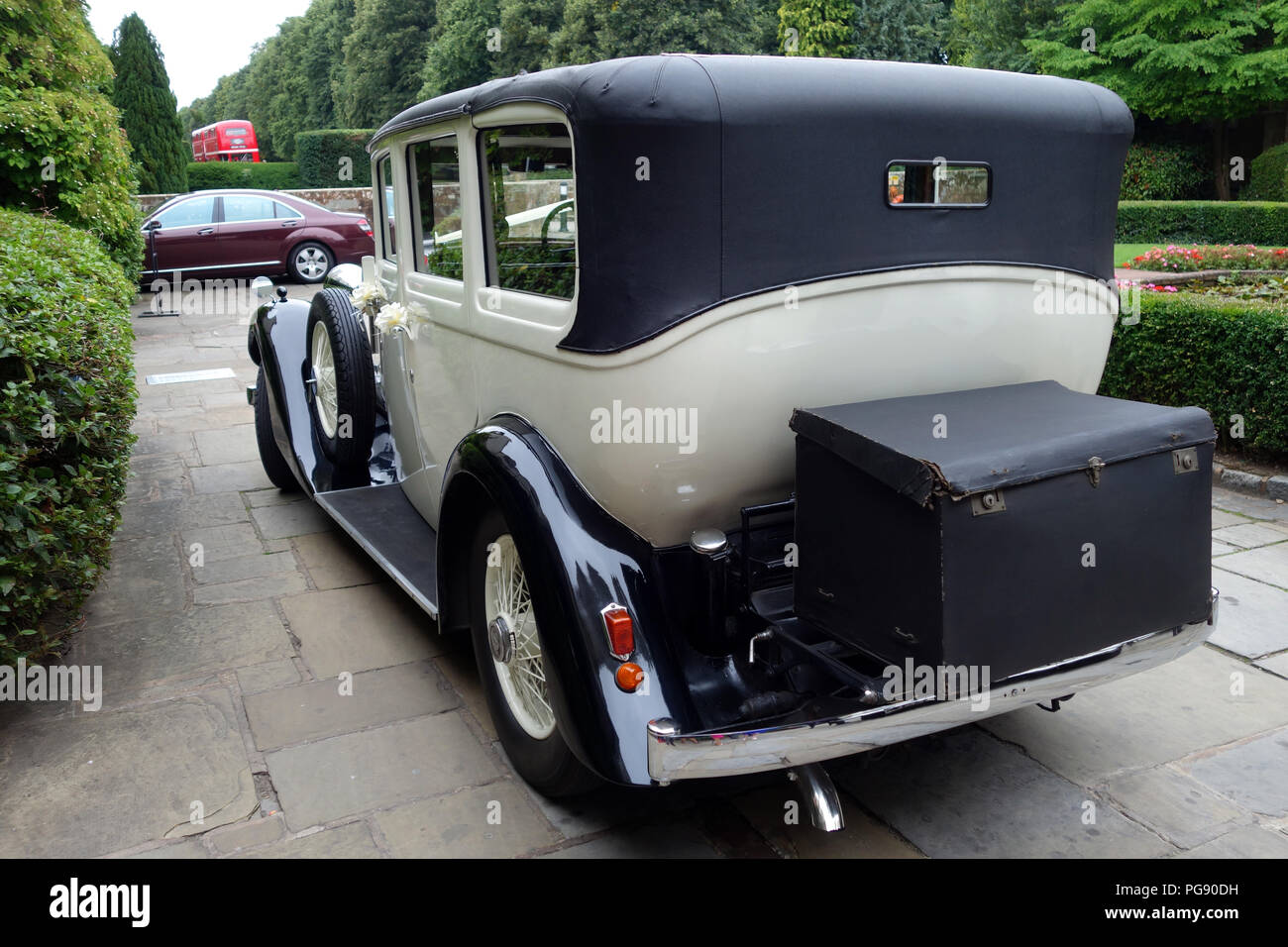 Rear view and small rear window of a Rolls Royce vintage wedding car at ...