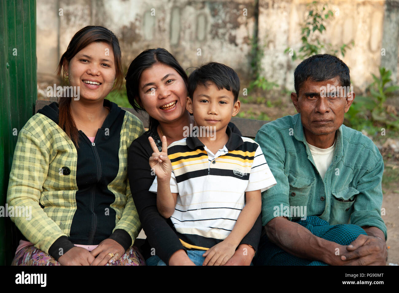Happy burmese family group picture hi-res stock photography and images ...