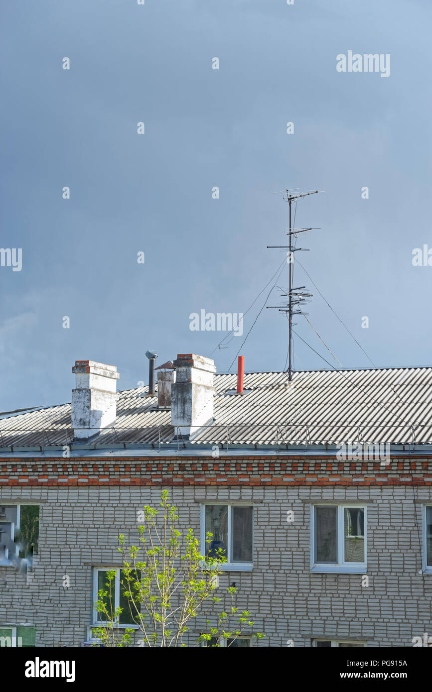 Brick apartment building with chimneys hi-res stock photography and ...
