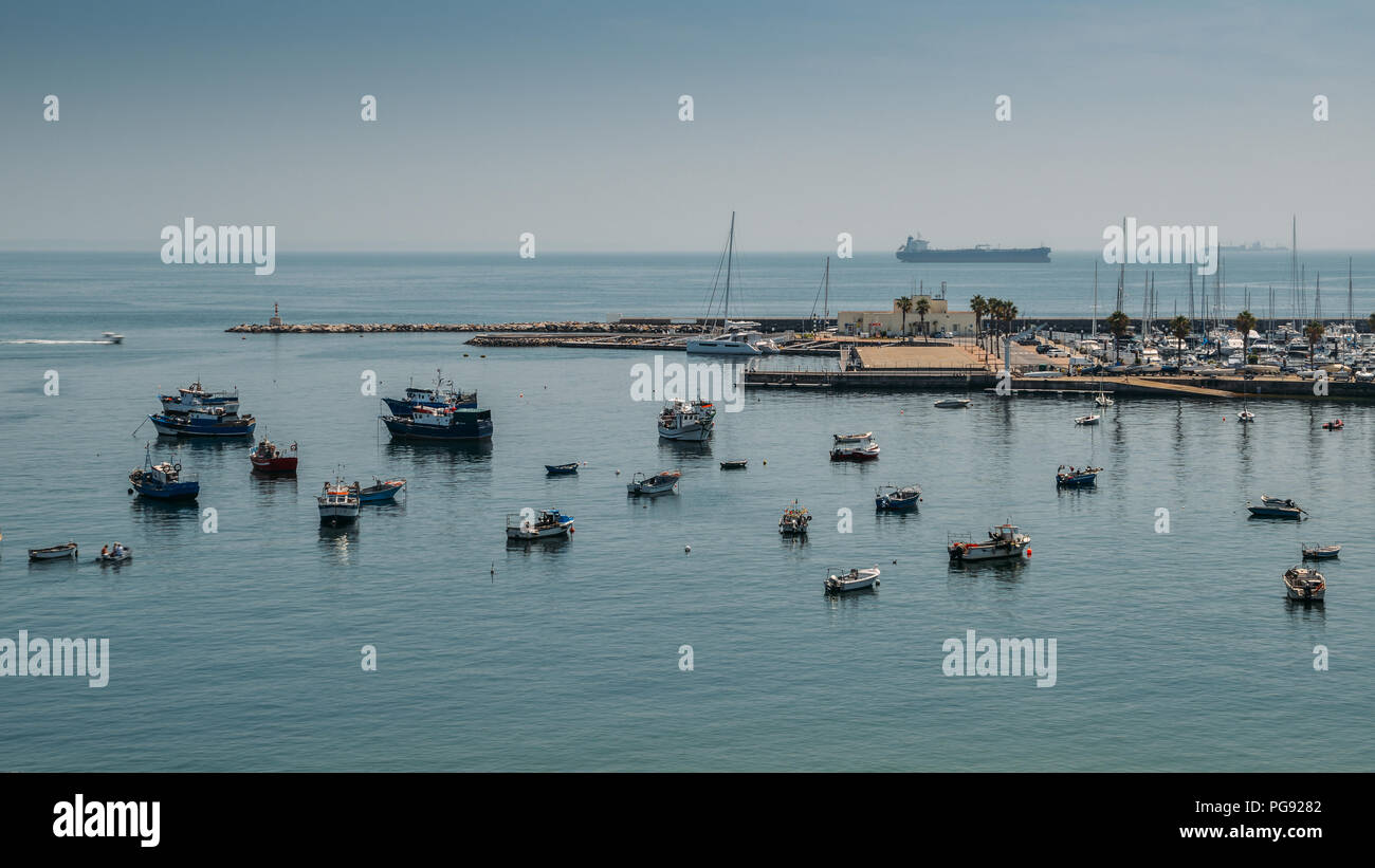 High perspective view of fishing boats floating in the fish port of ...