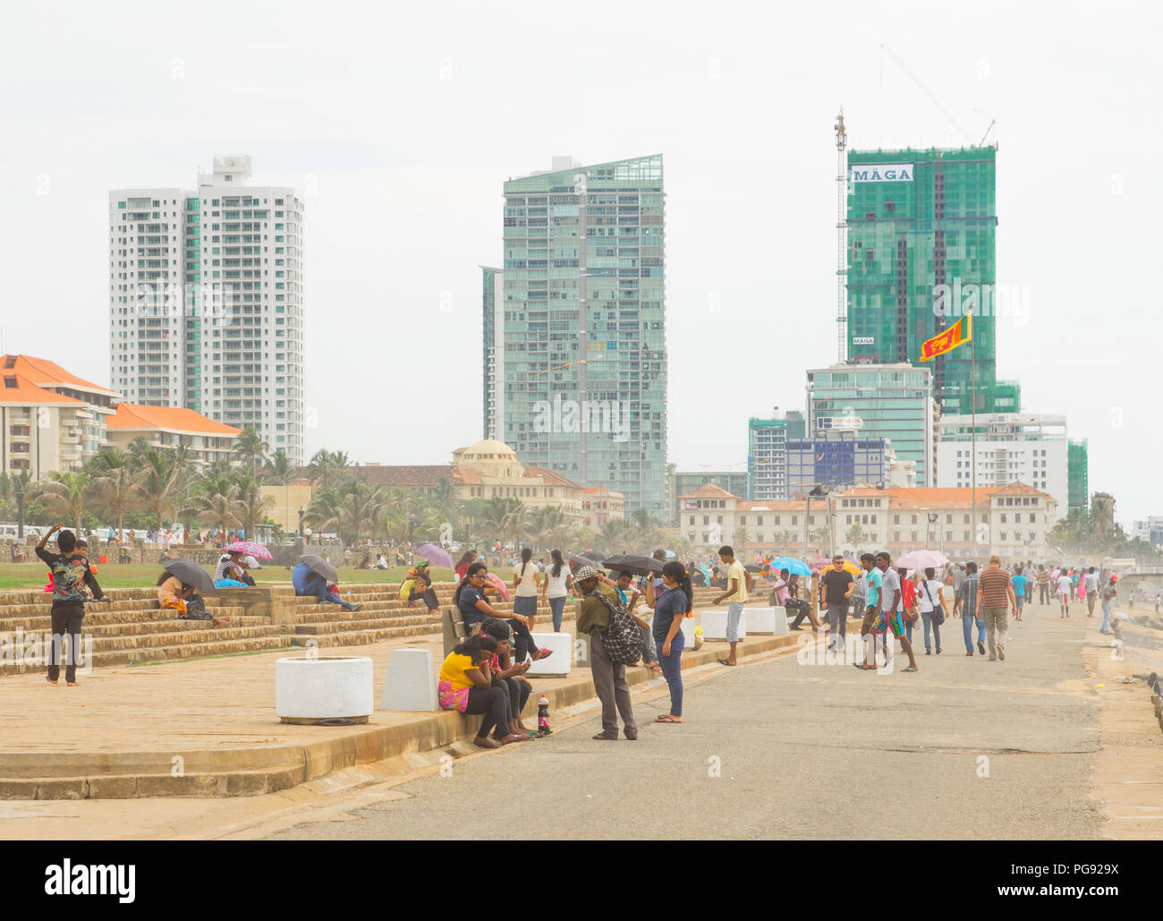 people relaxing on beachfront Galle Face Green in Colombo, Sri Lanka on ...