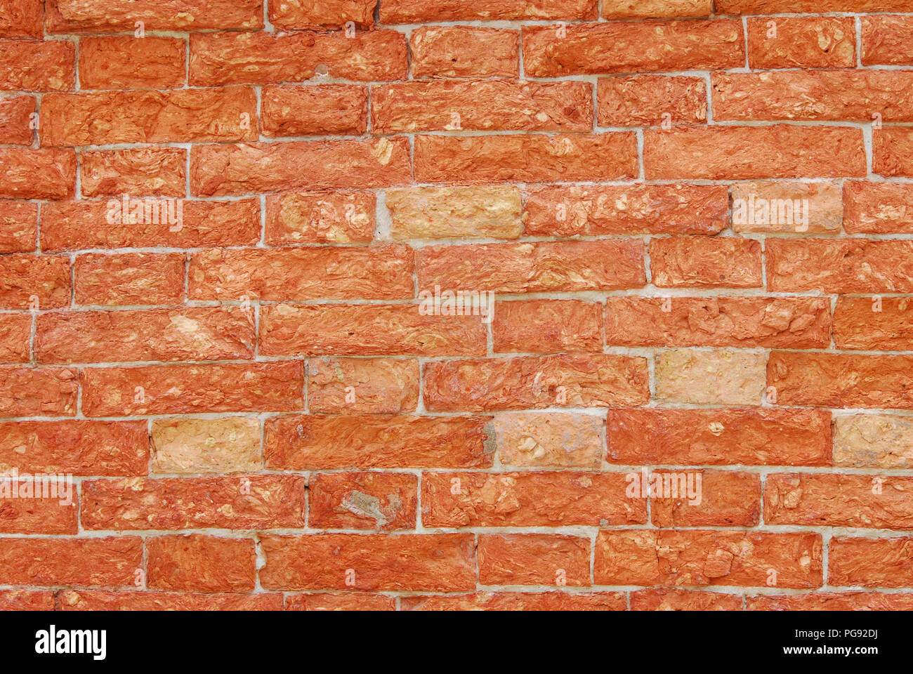 Damaged red brick wall as background Stock Photo - Alamy