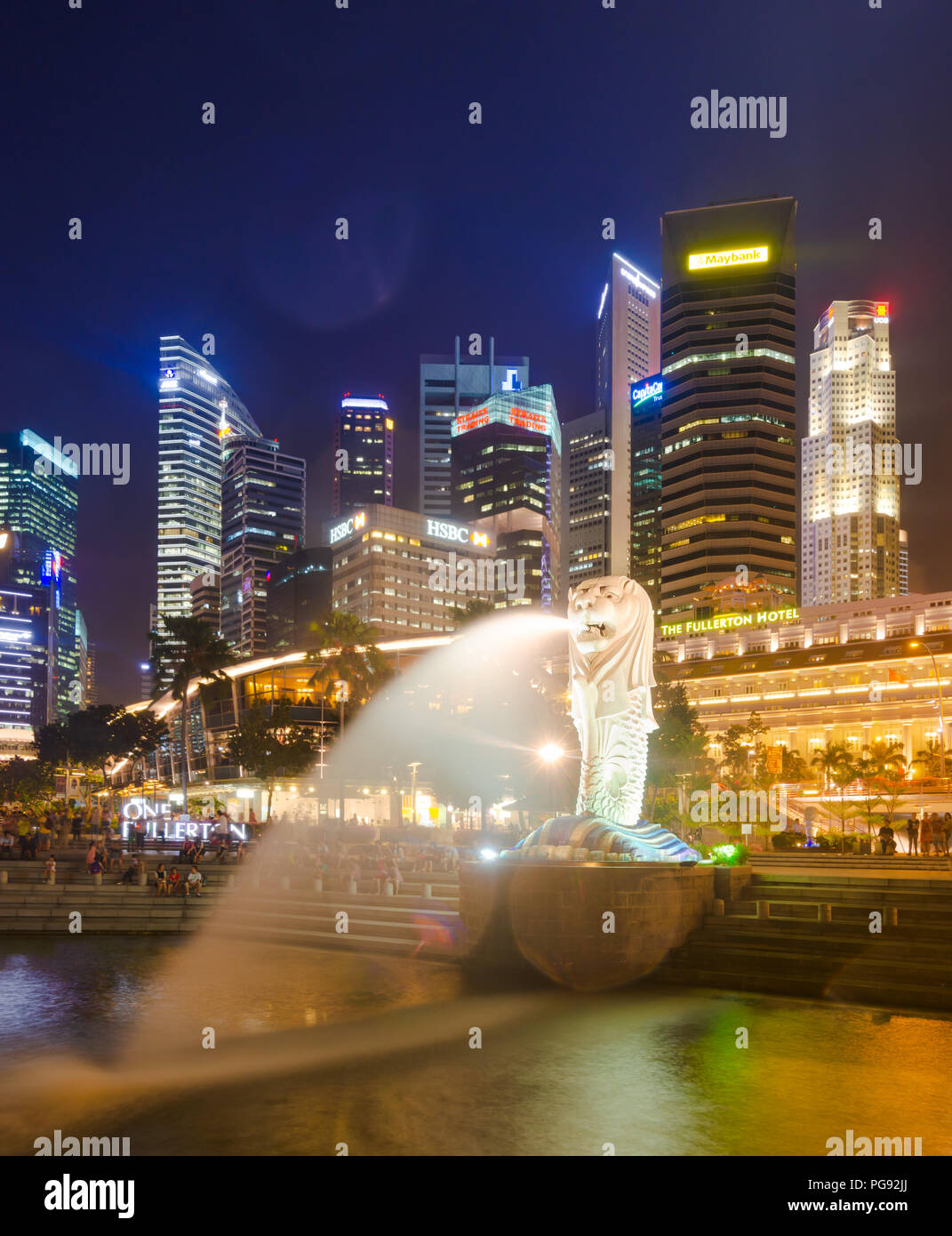SINGAPORE - 17 Jul 2014: the iconic Merlion spits water in front of the ...