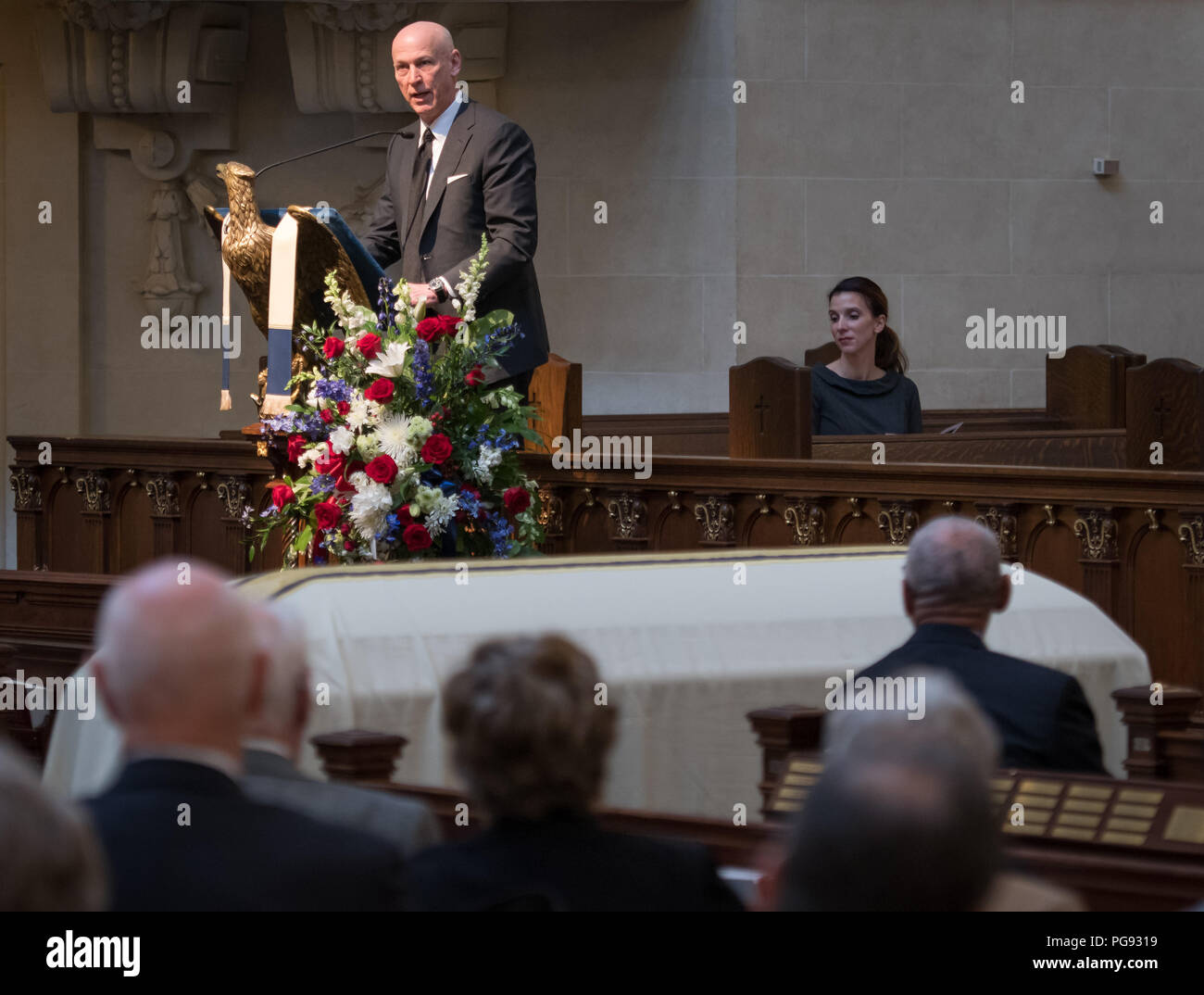 Bruce McCandless III gives remarks during the funeral service for his ...