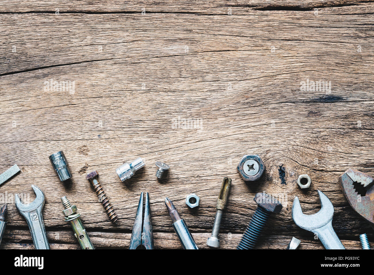 Variety Handy Tools on grunge wooden background. Top view close up of ...