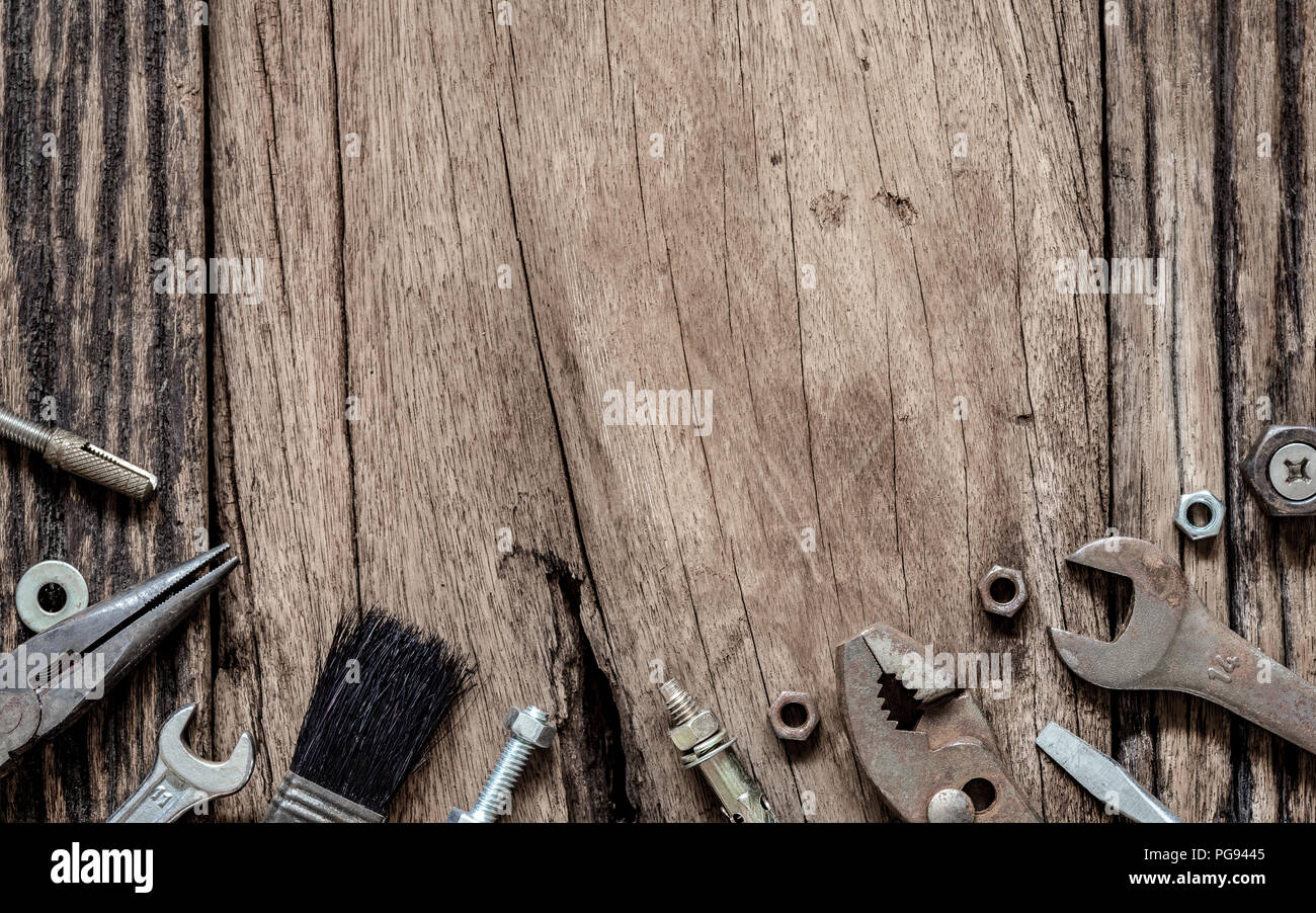 Variety Handy Tools on grunge wooden background. Top view close up of ...
