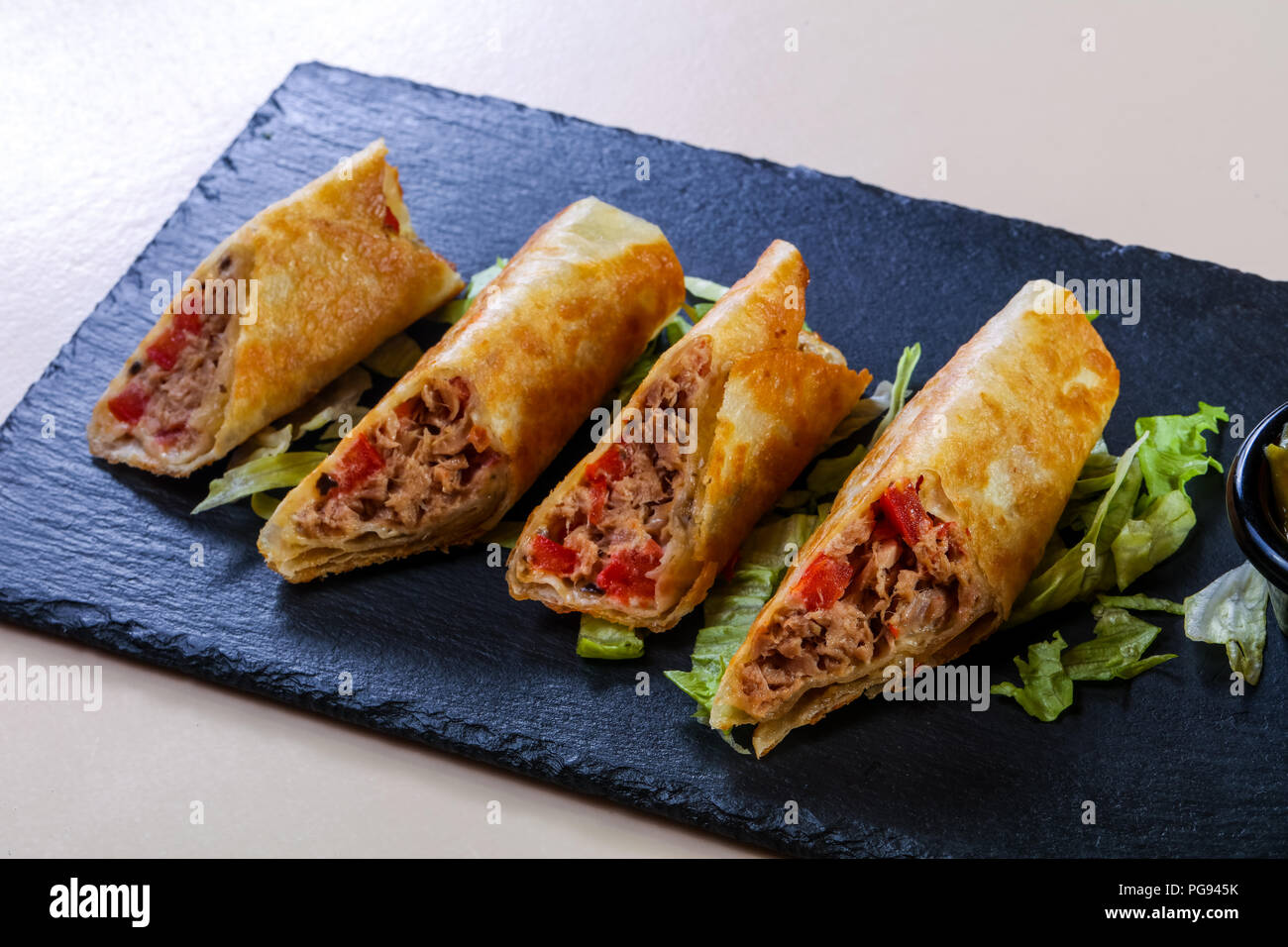 Hot Meat pastries with sauce Stock Photo - Alamy