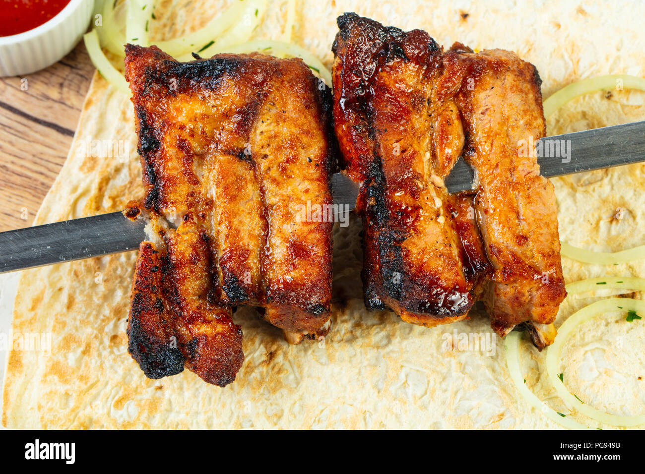 Grilled pork ribs skewer kebab Stock Photo - Alamy