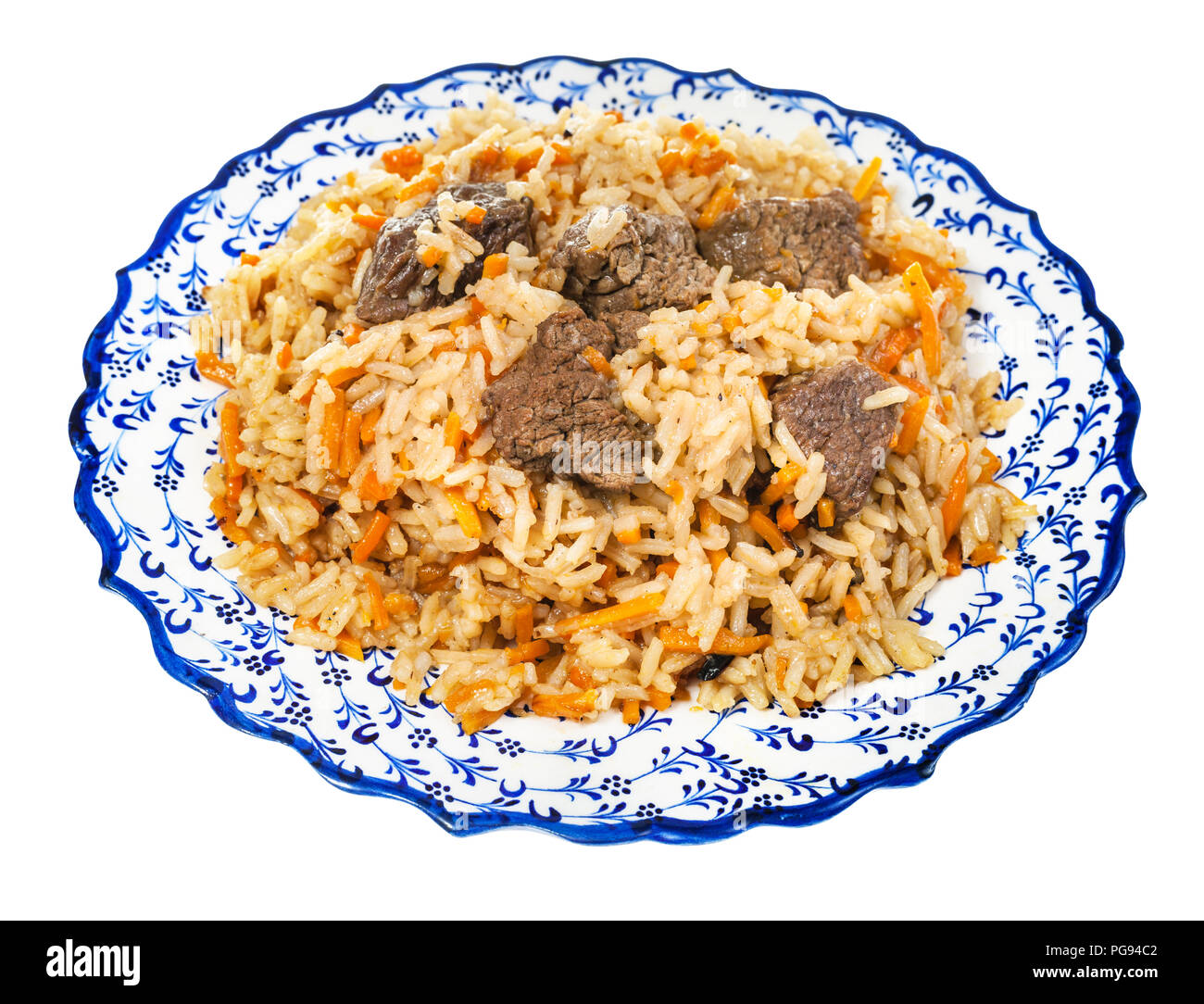above view of cooked pilaf (central asian dish from rice with meat and ...