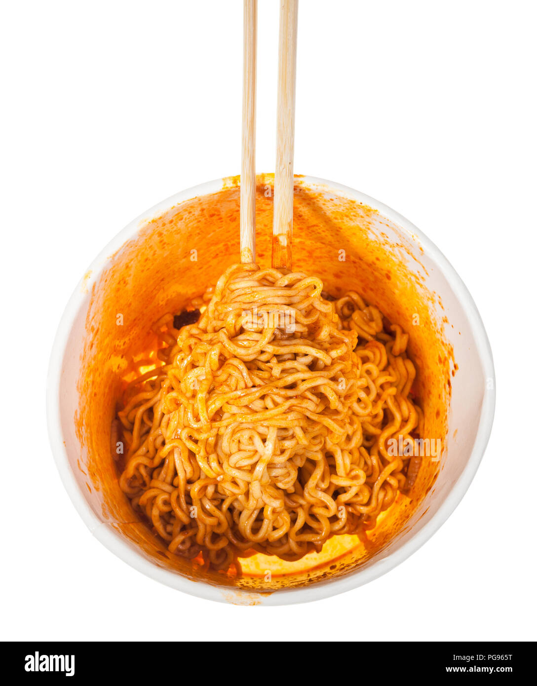 top view of wooden chopsticks in cup with prepared spicy instant ...