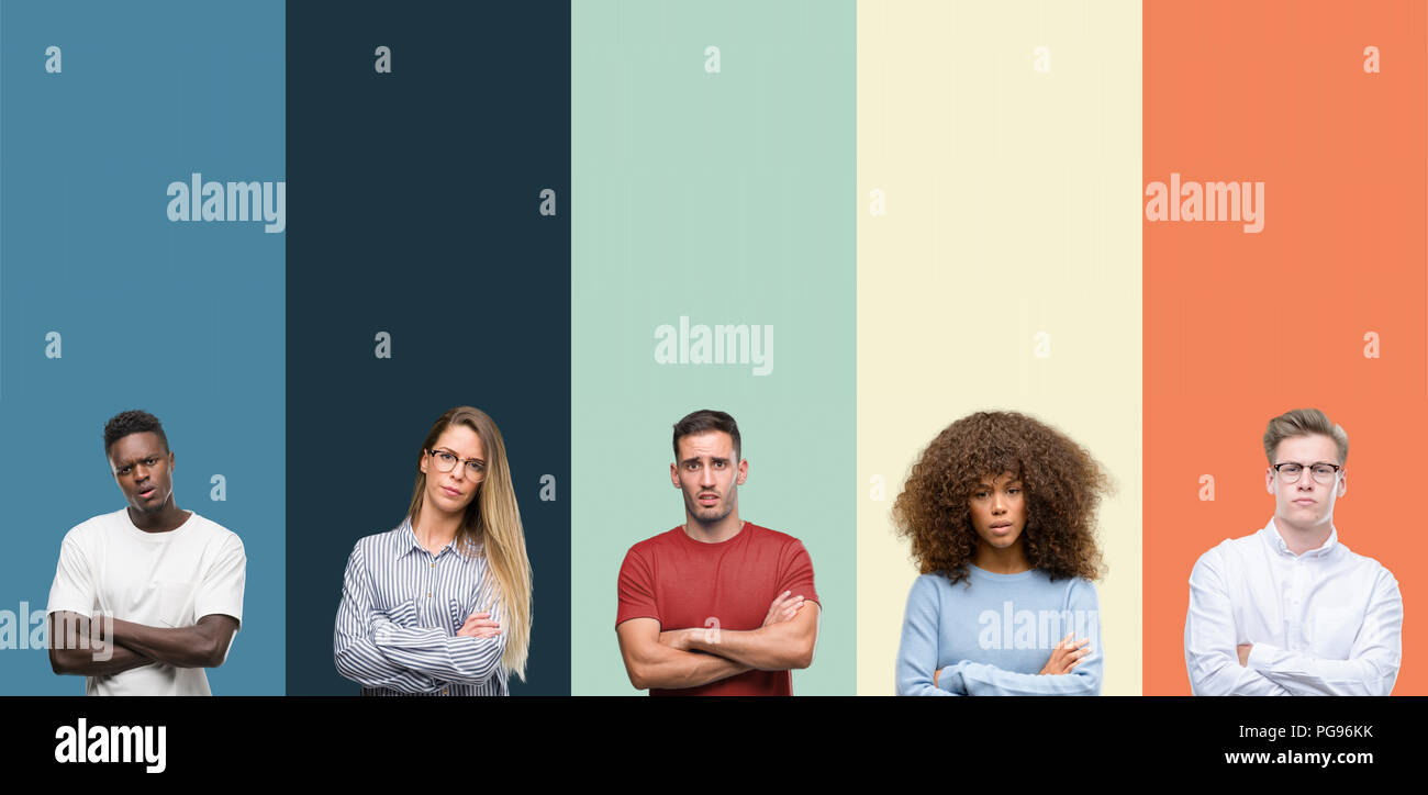 Group of people over vintage colors background skeptic and nervous ...