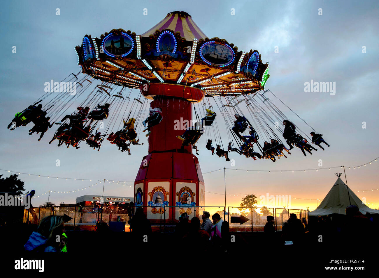 The sun sets during the Big Feastival at Alex James' farm in Kingham ...