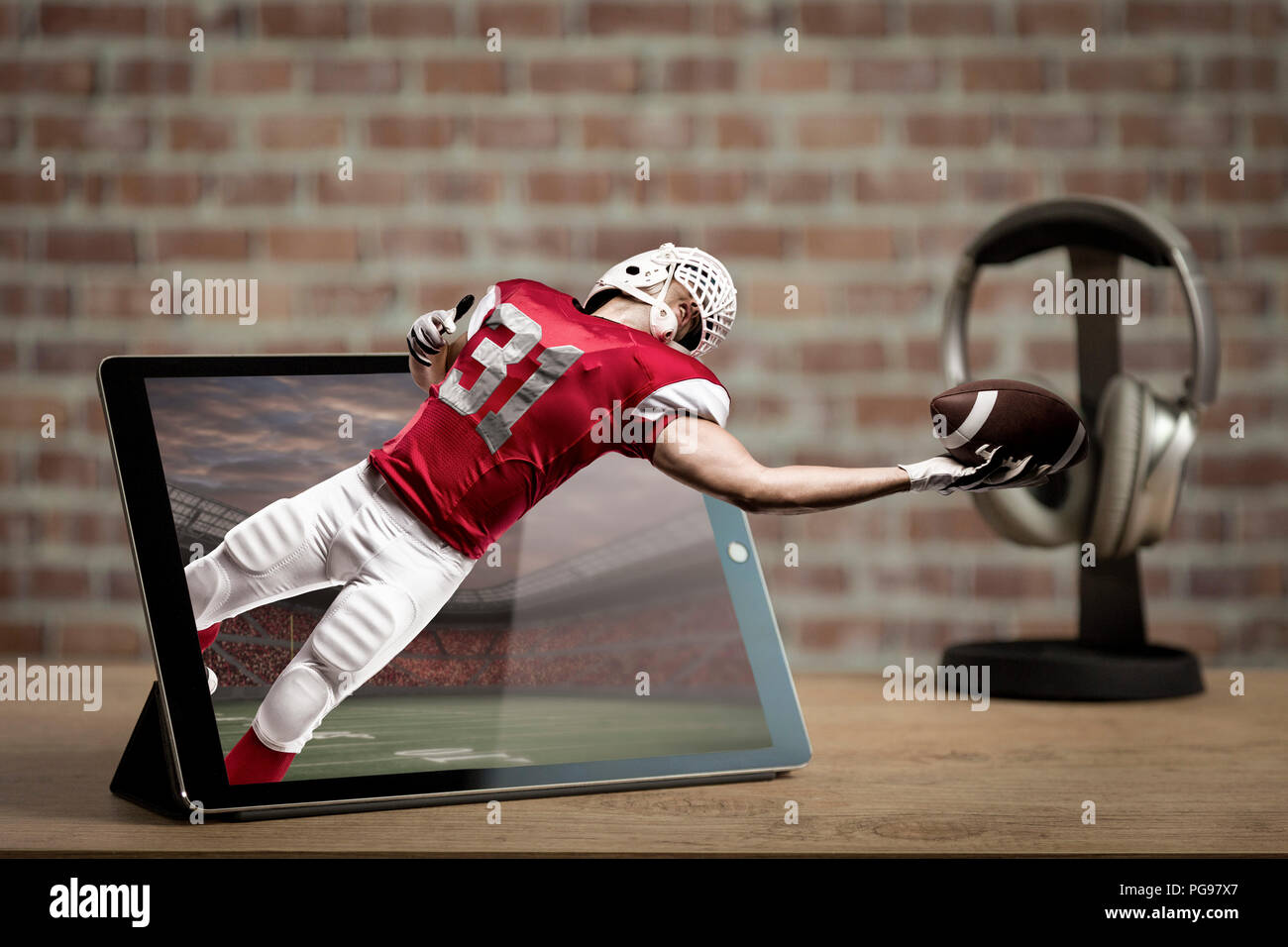 Football Player with a red uniform Playing playing and coming out of a ...